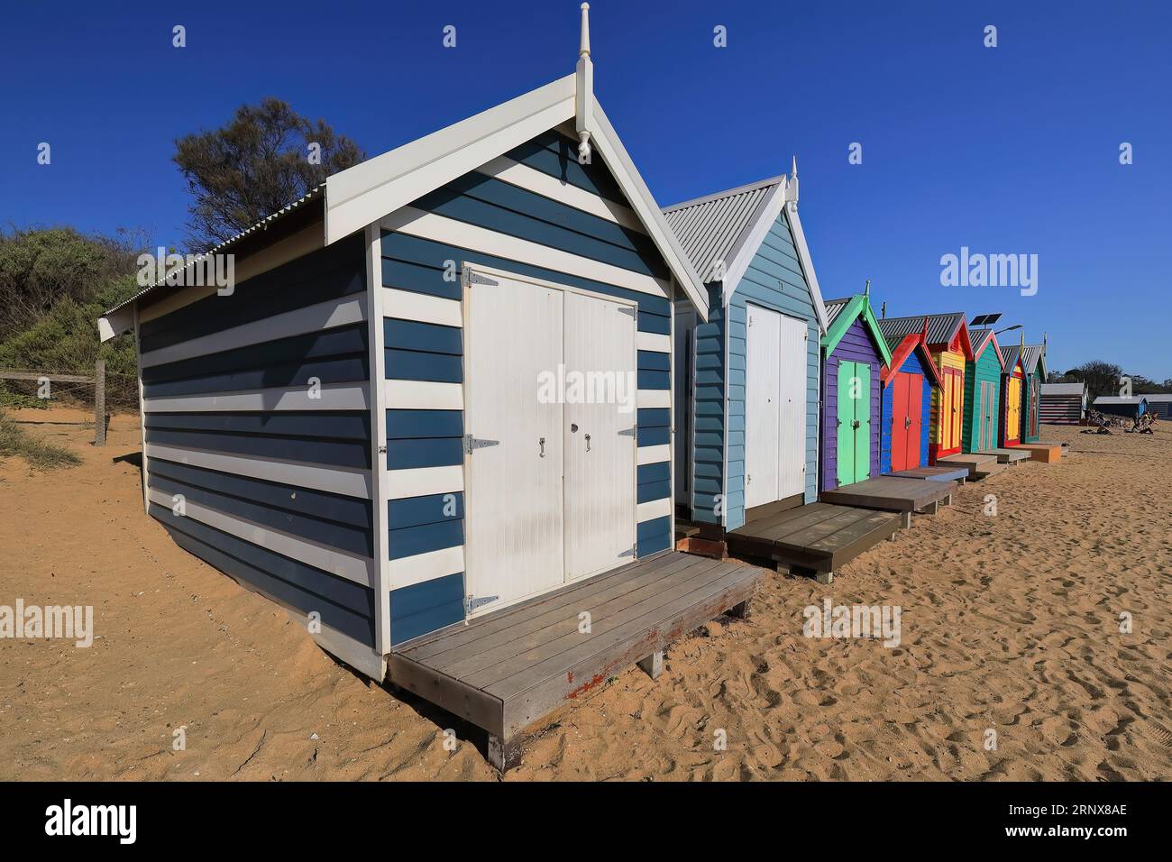 903 Partial run of the 82 brightly painted Victorian bathing boxes on ...