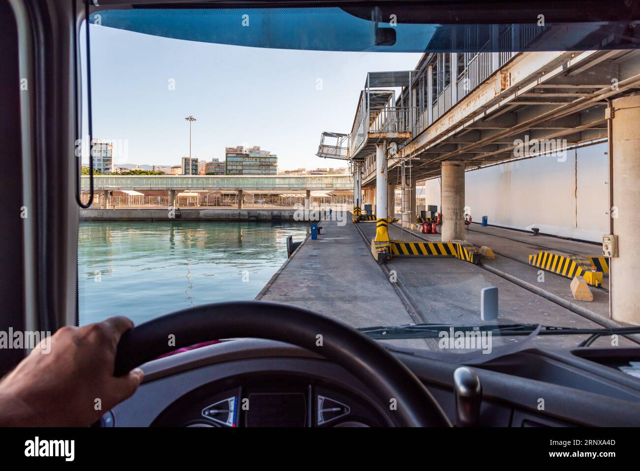 Truck leaving a dock in the port with the complications of the ...