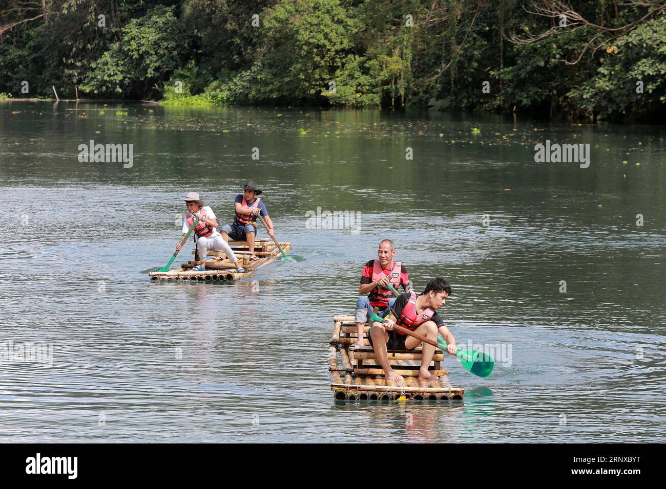 (180121) -- QUEZON, Jan. 21, 2018 -- Tourists paddle on board bamboo ...
