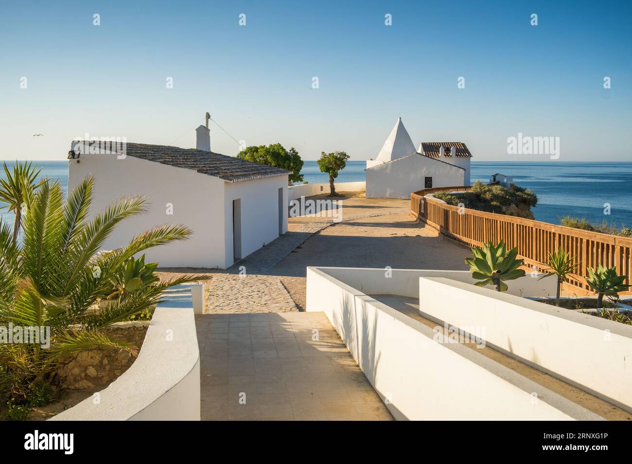 Chapel Nossa Senhora da Rocha in Portugal at sunset Stock Photo - Alamy