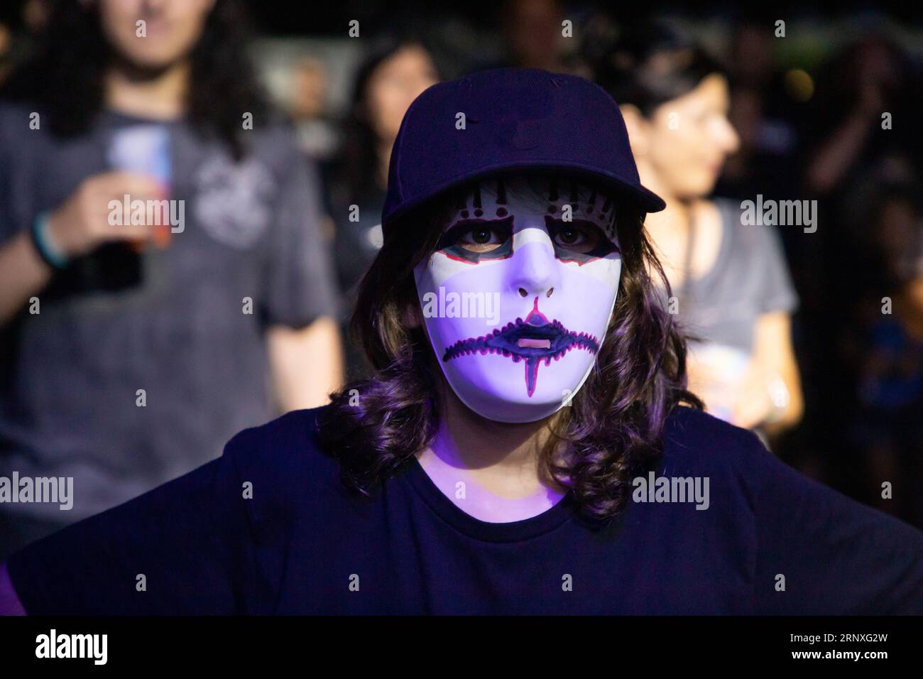 kid wearing scary mask at Halloween party Stock Photo - Alamy