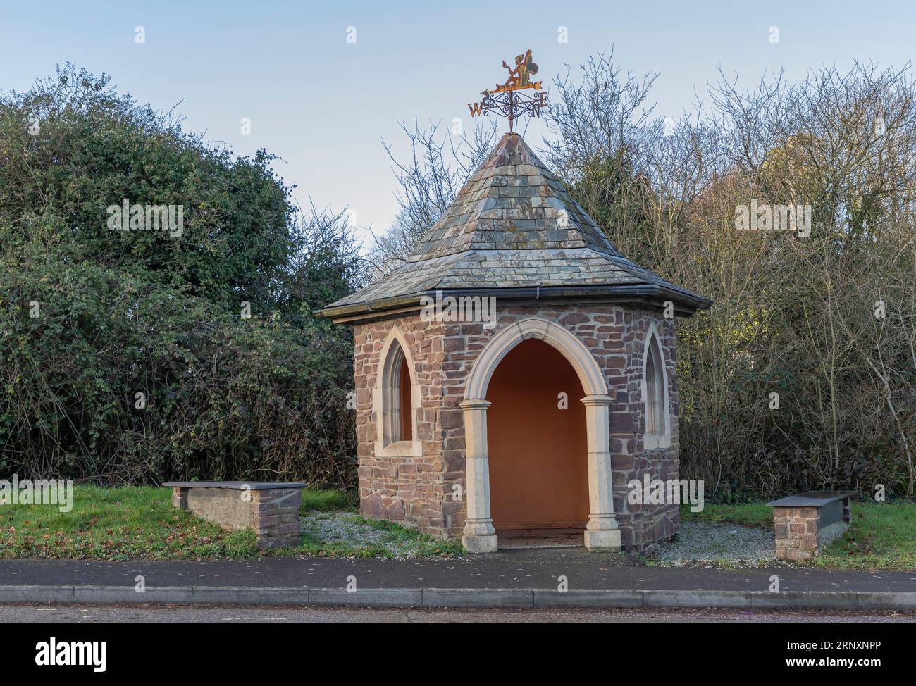 Fairy weather vane and a pointed roof painted orange inside Stock Photo ...
