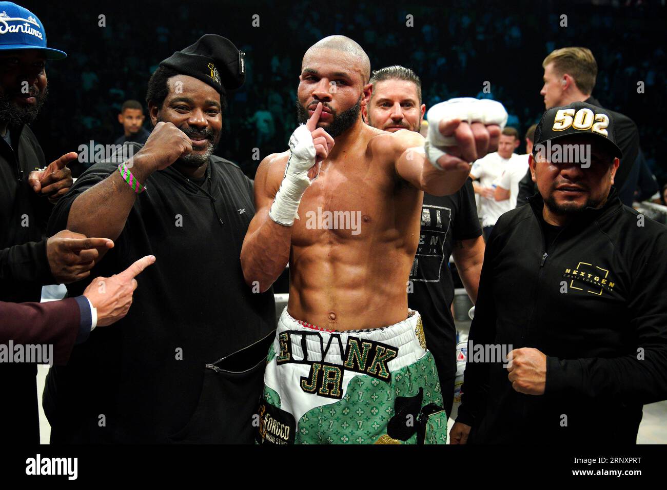 Chris Eubank Jr (centre) with trainer Brian McIntyre after victory ...