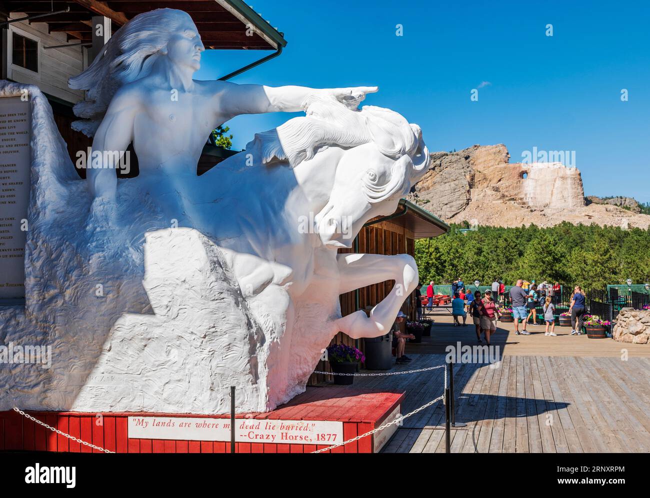 Scale model with Crazy Horse Memorial sculpture in background; Custer ...