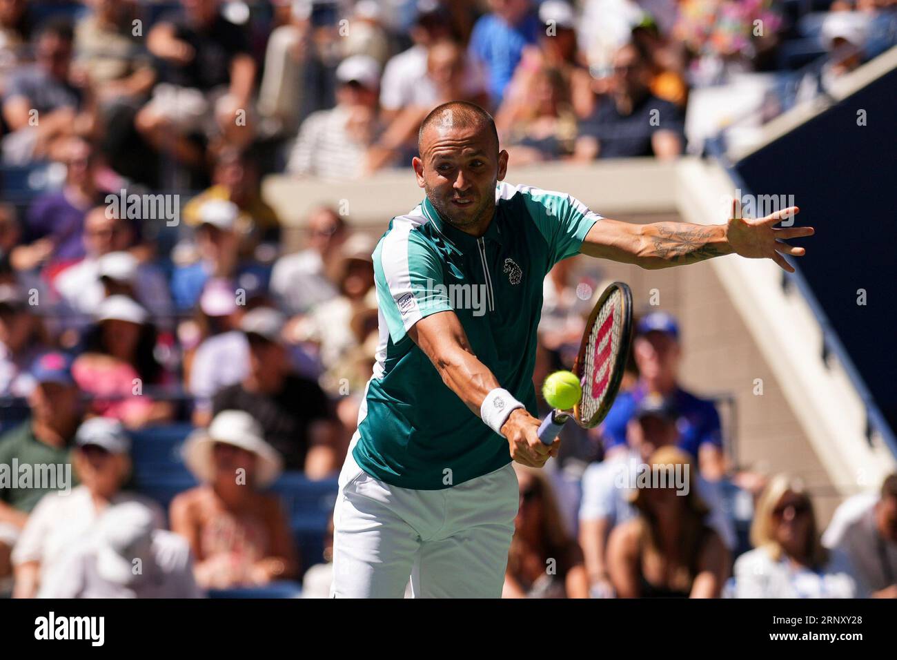 Daniel Evans in action during a men's singles match at the 2023 US Open ...