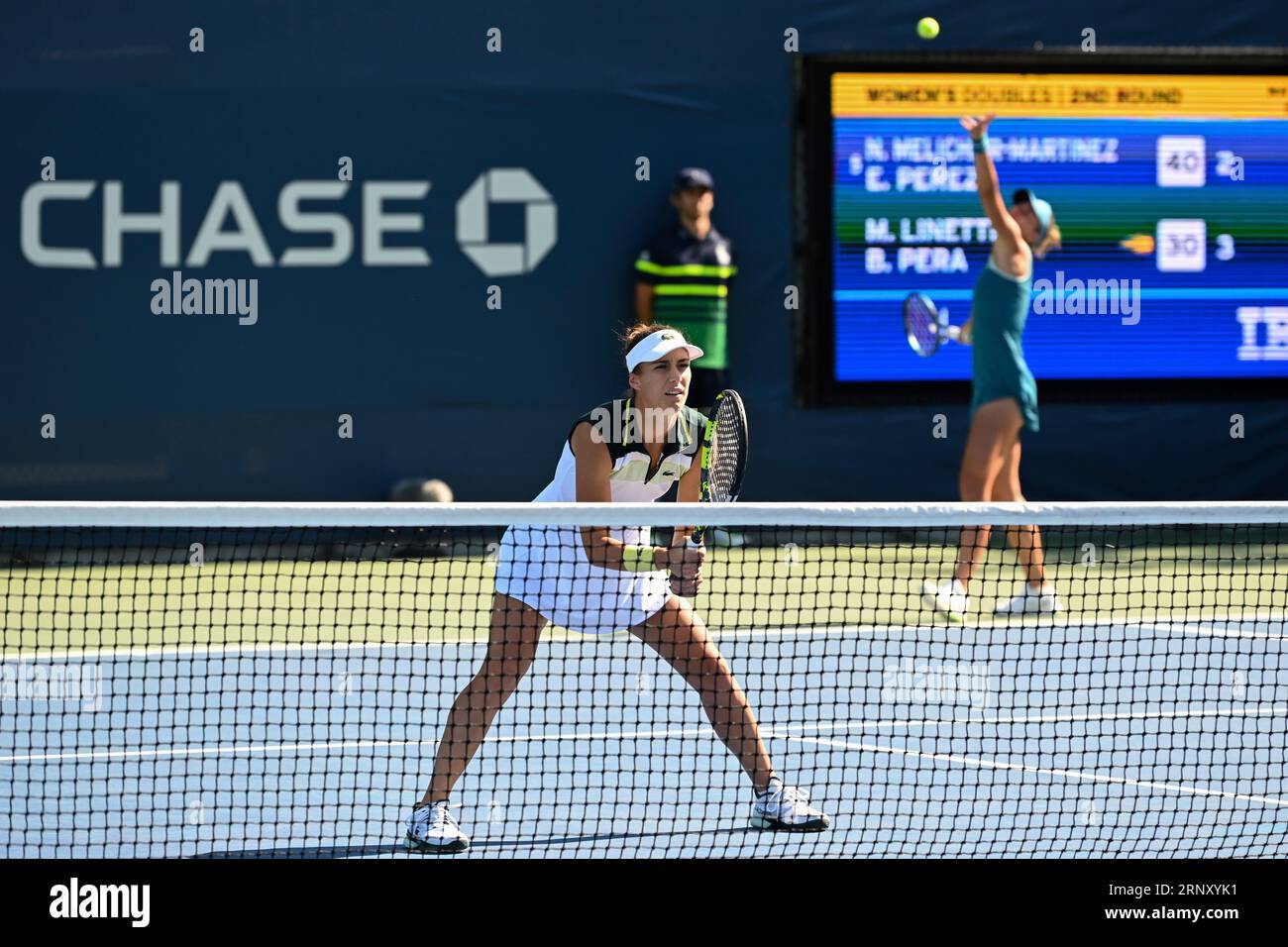 Magda Linette and Bernarda Pera in action during a women's doubles ...