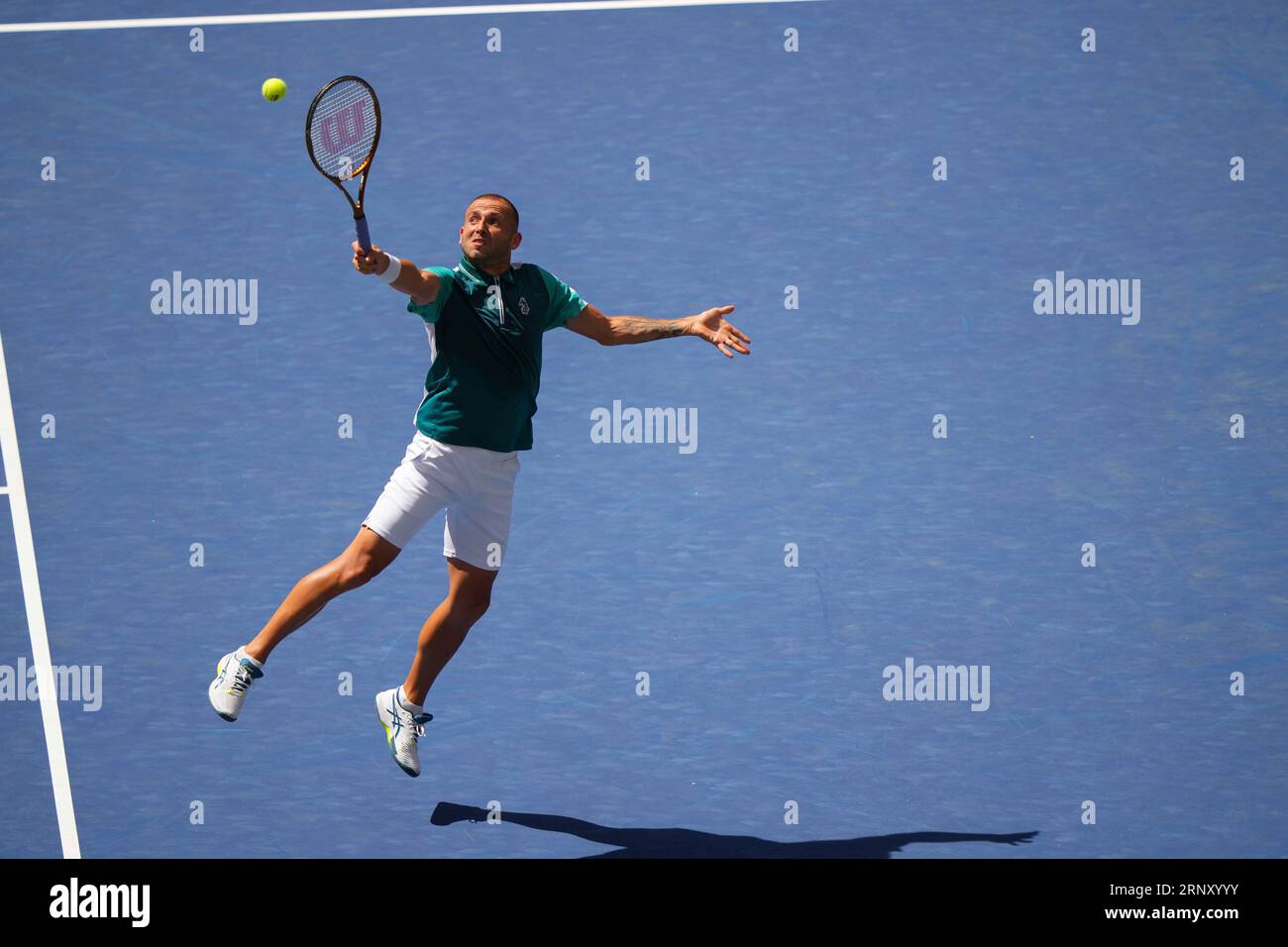 Daniel Evans in action during a men's singles match at the 2023 US Open ...