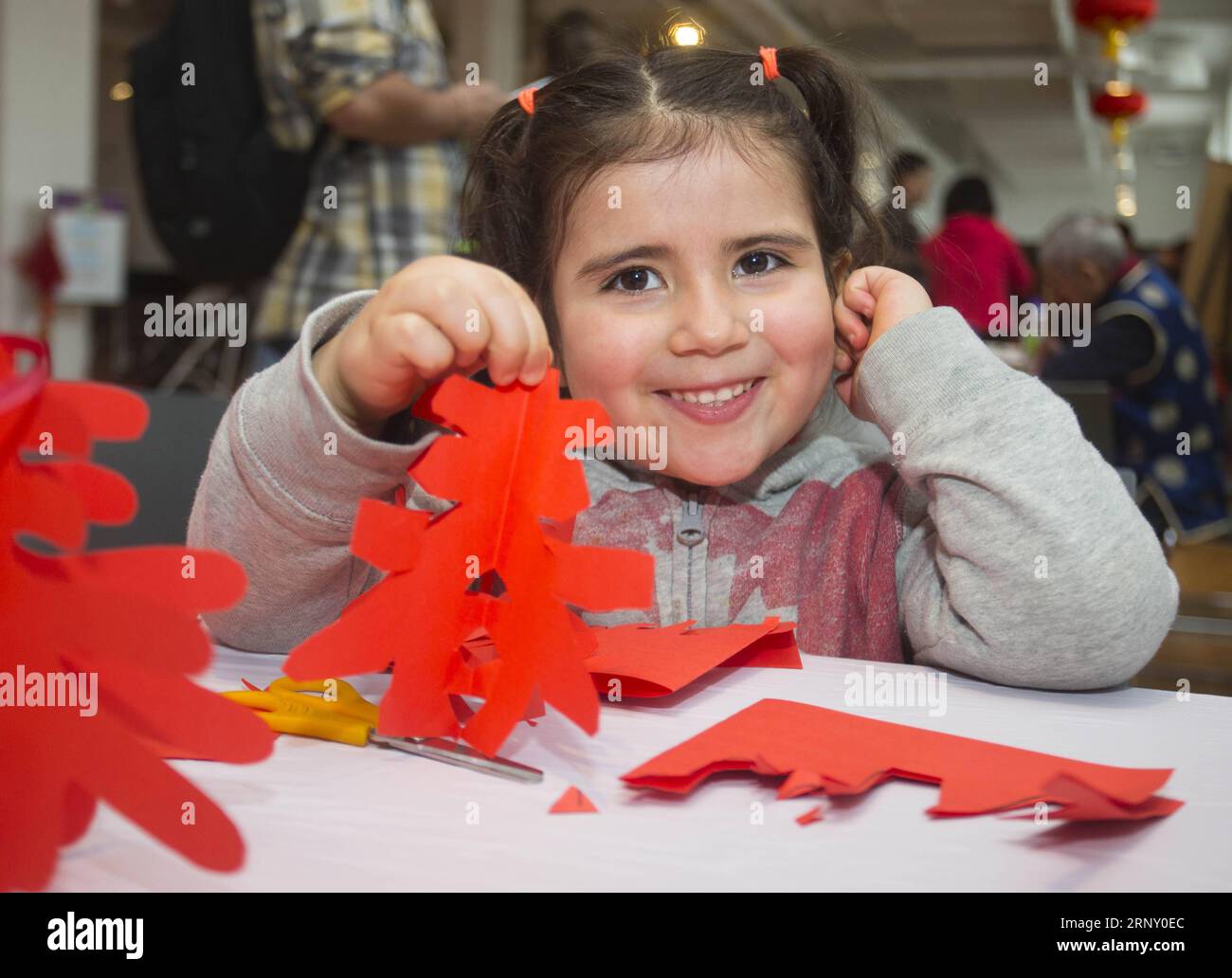(180219) -- TORONTO, Feb. 19, 2018 -- A girl shows her papercut craft ...
