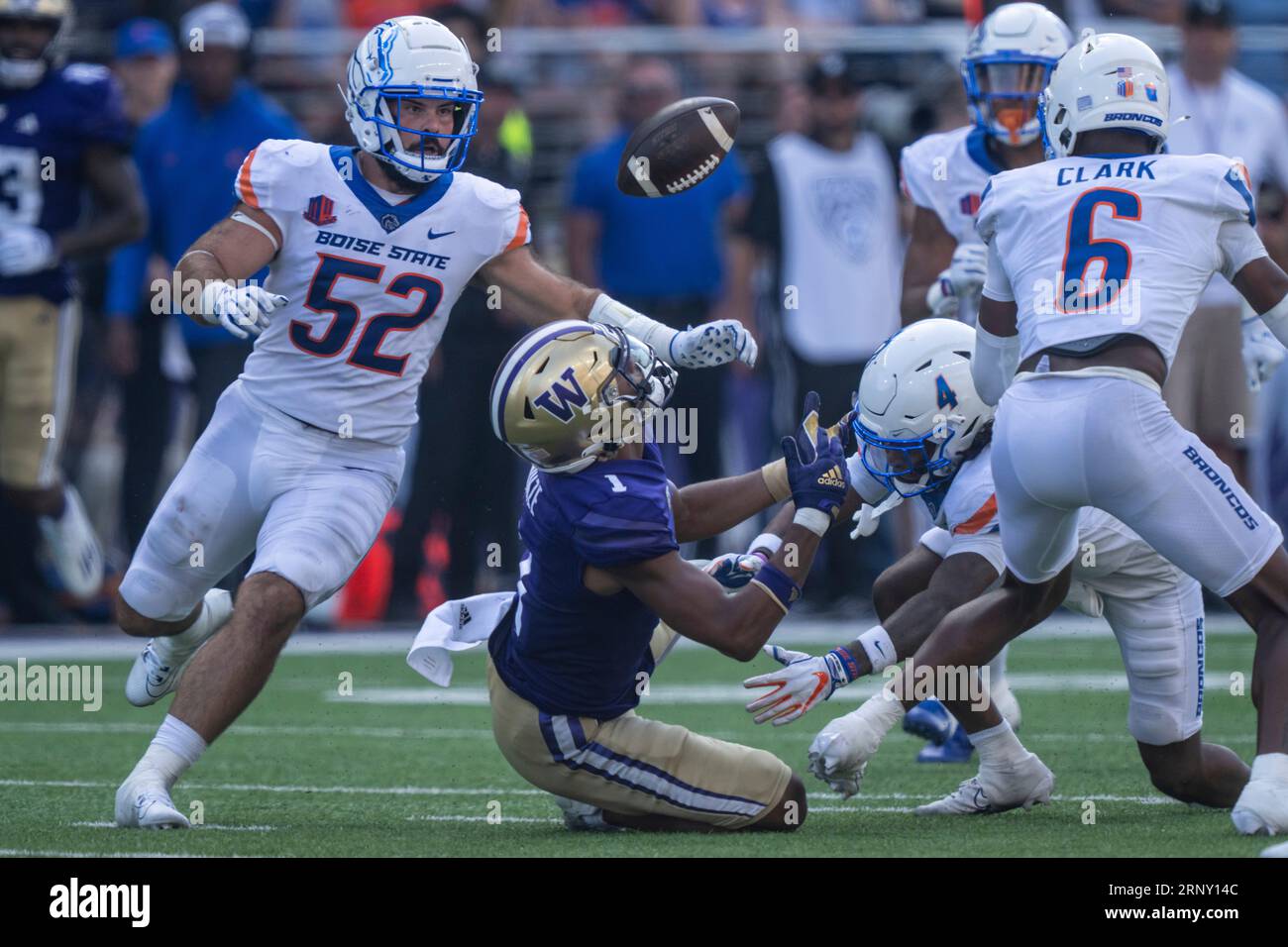 Boise State linebacker DJ Schramm, left, defensive back Rodney Robinson ...