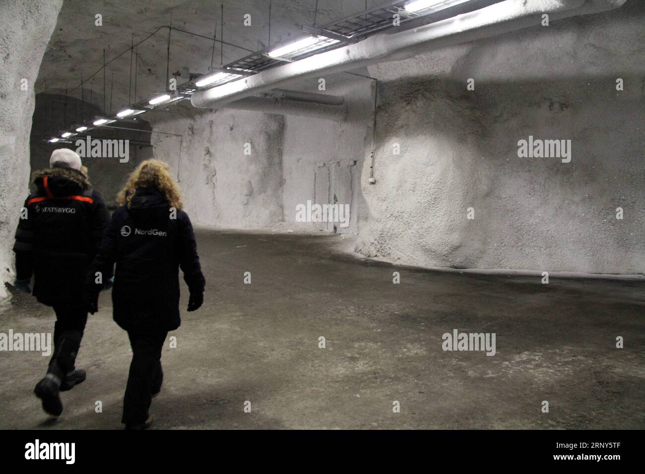 (180301) -- SVALBARD, March 1, 2018 -- Staff members walk inside the ...