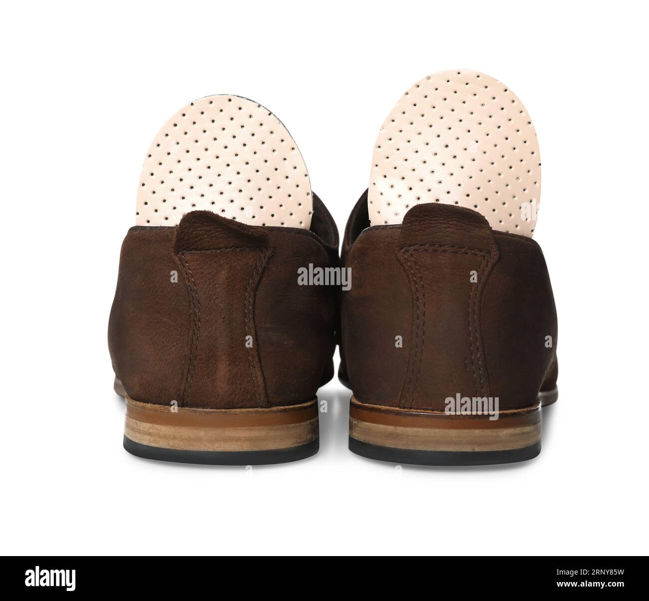Orthopedic insoles in shoes on white background Stock Photo - Alamy