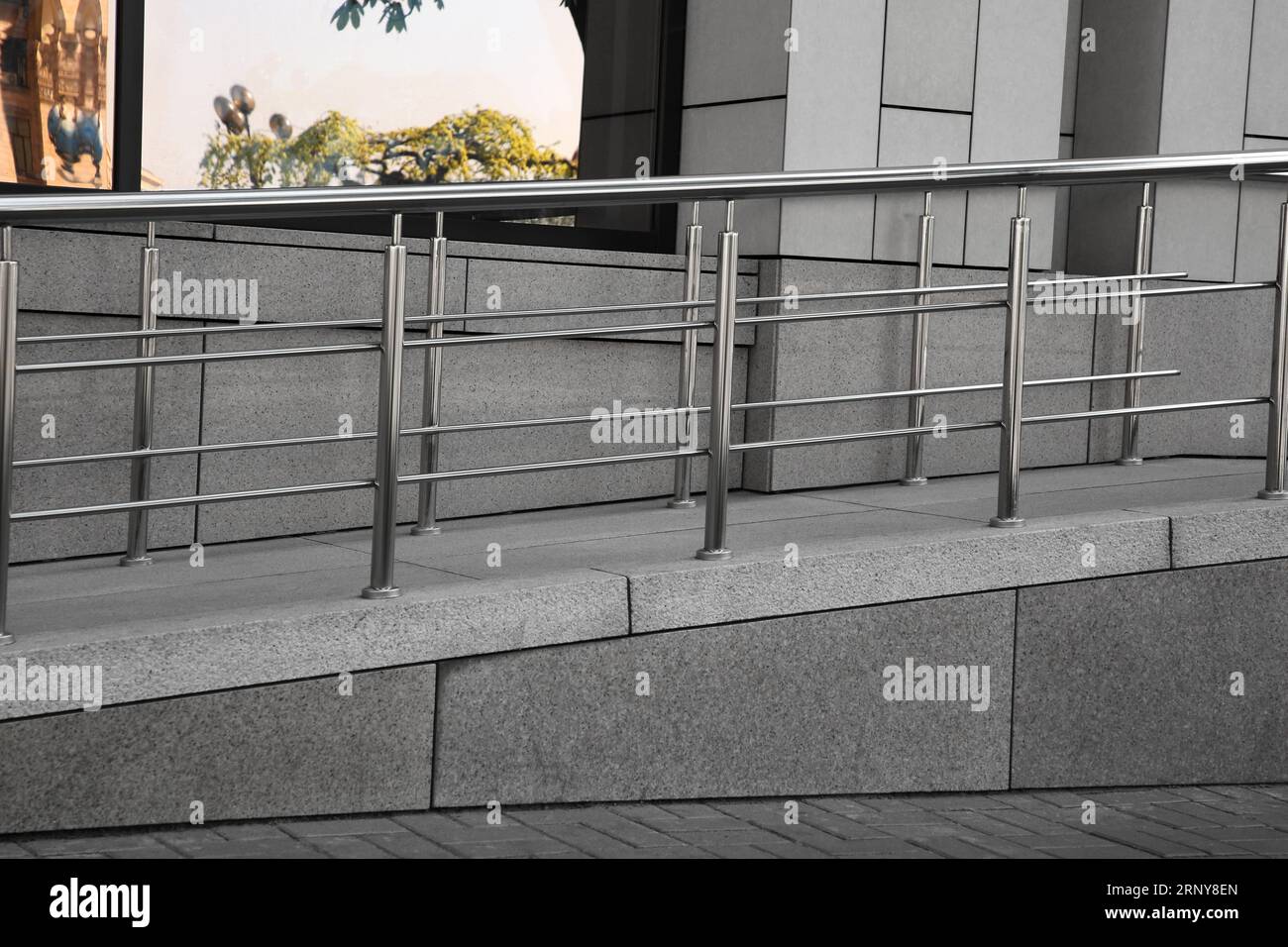 Ramp with metal handrails near building outdoors Stock Photo - Alamy