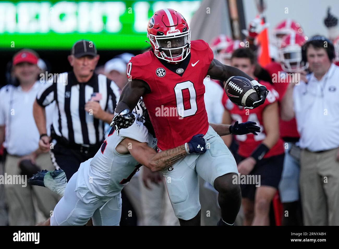 Georgia running back Roderick Robinson II (0) is tackled by Tennessee ...