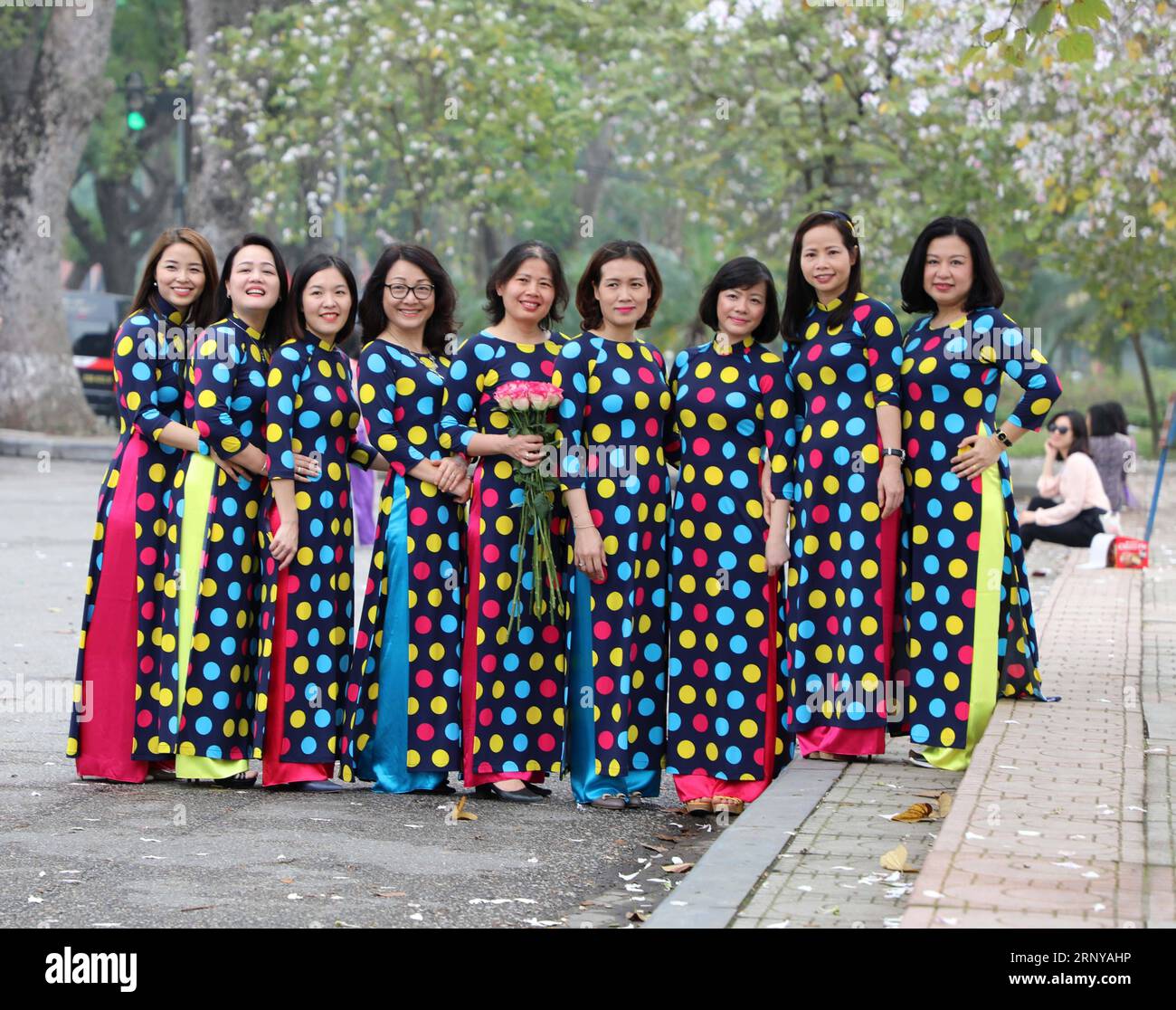 Ao dai wearing hanoi women hi-res stock photography and images - Alamy