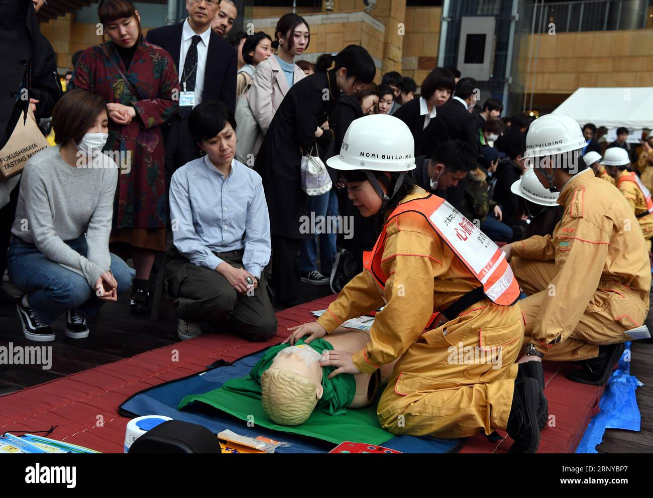 (180309) -- TOKYO, March 9, 2018 -- People receive a first-aid lesson ...