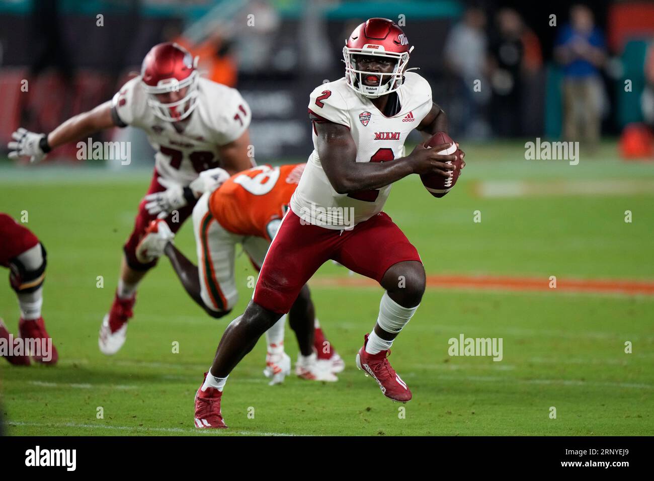 Miami (Ohio) quarterback Aveon Smith (2) scrambles during the second ...