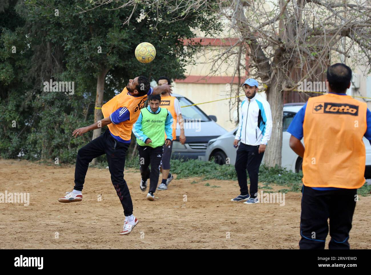 (180315) -- TRIPOLI, March 15, 2018 -- Libyan young men play football ...
