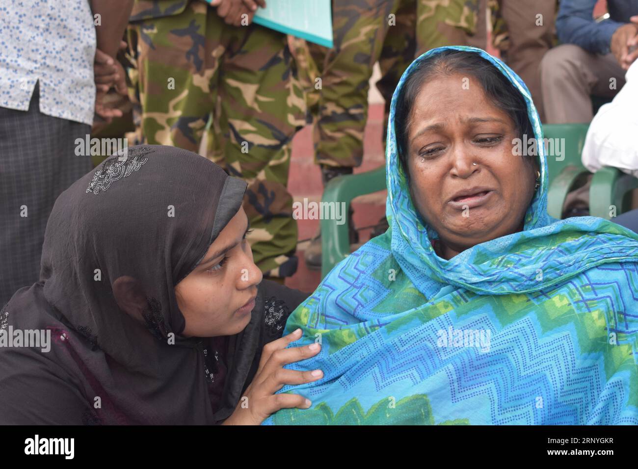 (180319) -- DHAKA, March 19, 2018 () -- A woman cries during mourning ...