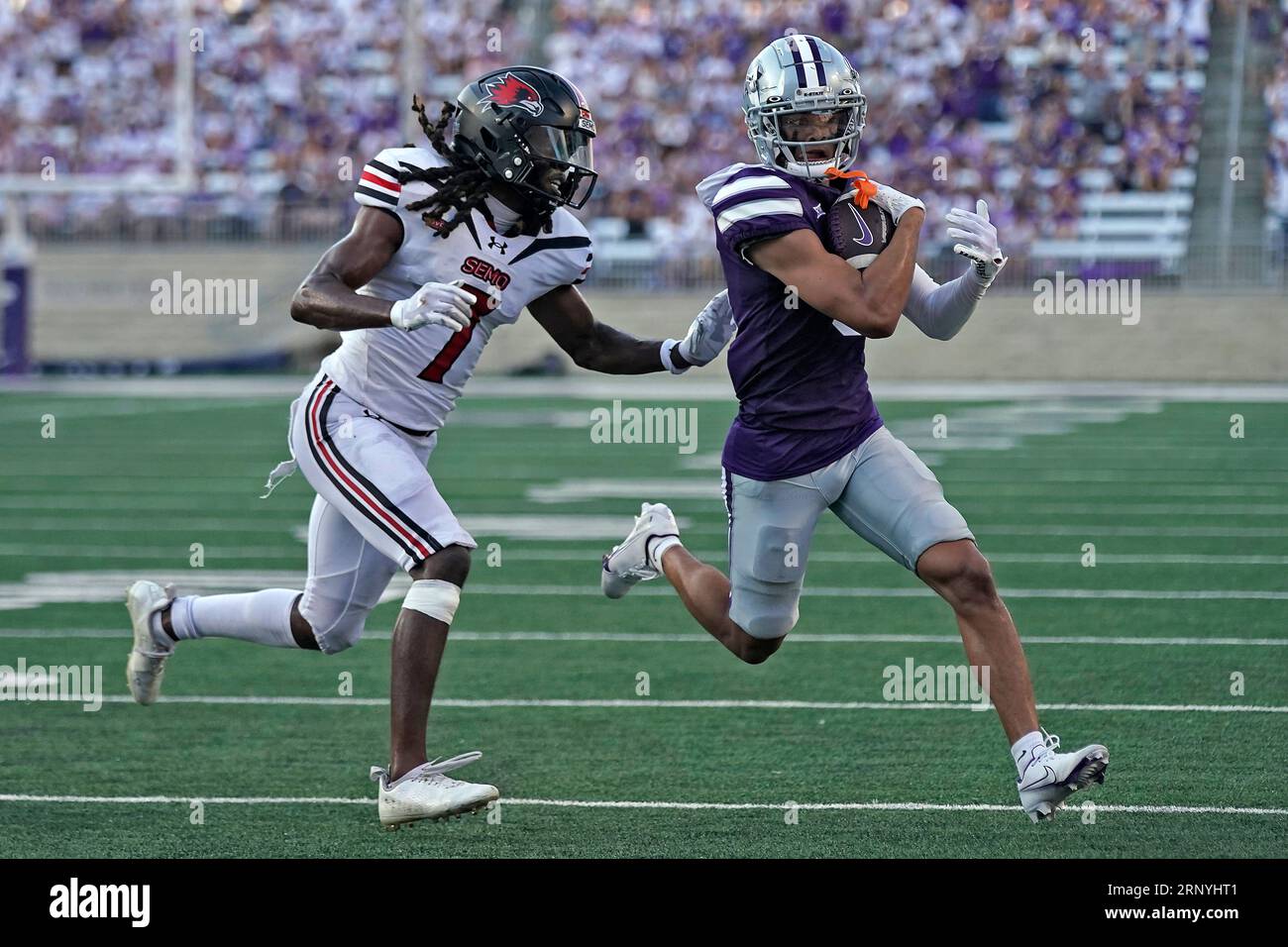 Kansas State wide receiver RJ Garcia II, right, is chased by Southeast ...