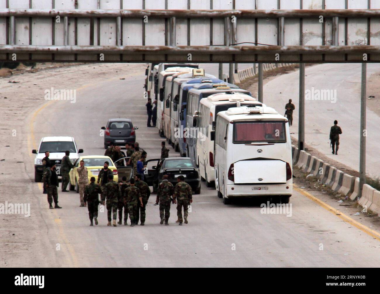 Military on buses hi-res stock photography and images - Alamy