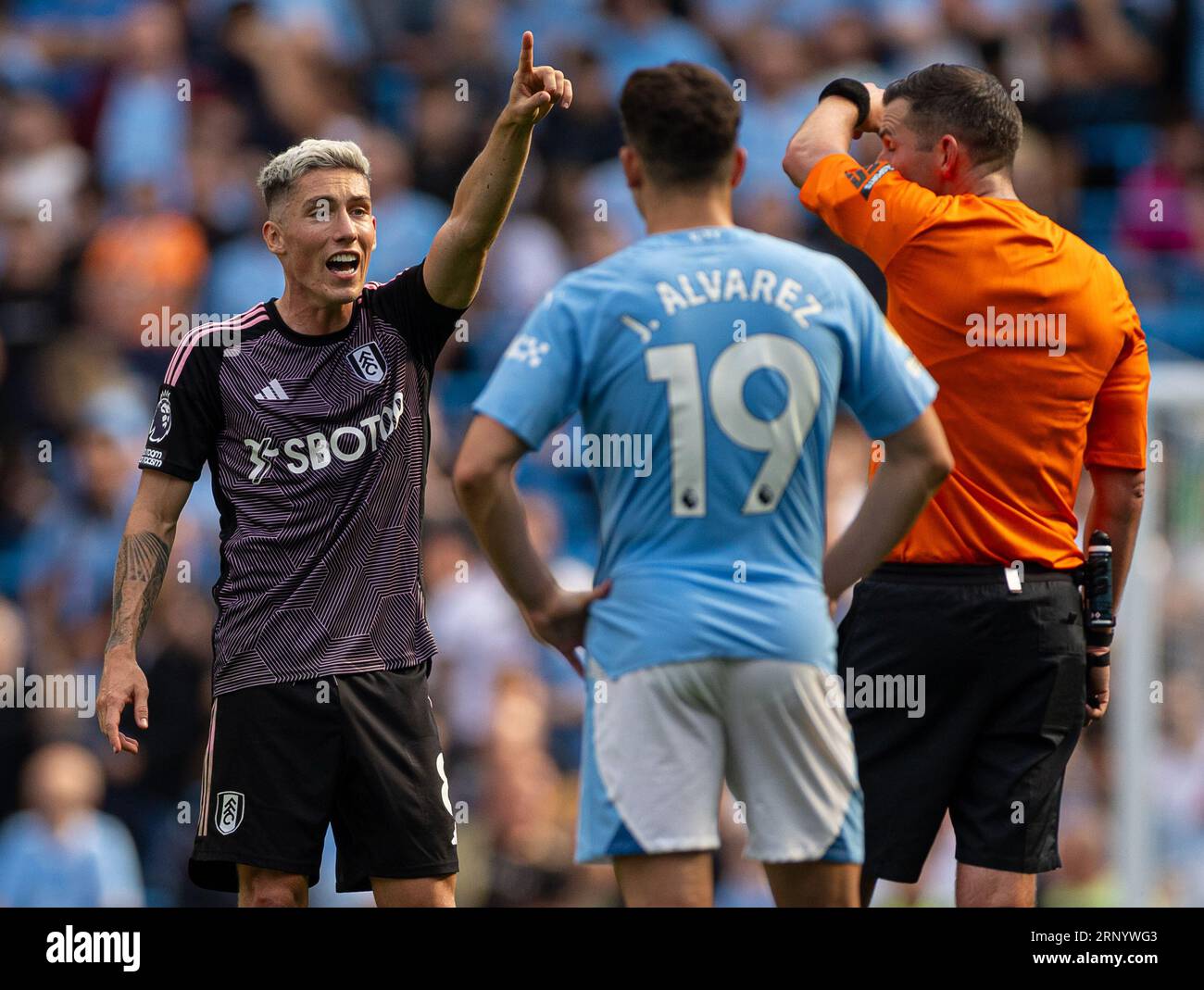 Manchester, UK. 3rd Sep, 2023. Fulham's Harry Wilson (L) reacts as ...