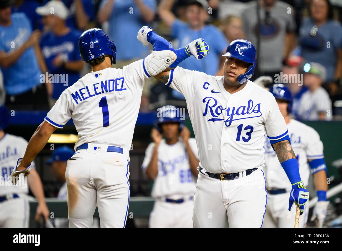 Kansas City Royals' MJ Melendez (1) is congratulated by Salvador Perez ...