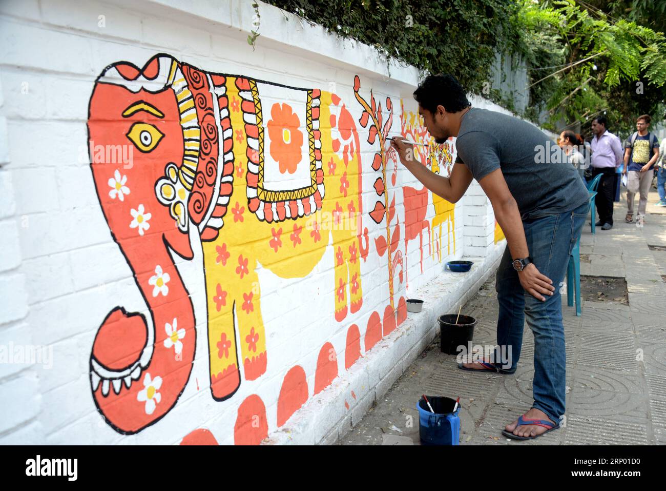 (180412) -- DHAKA, April 12, 2018 -- A Dhaka University student paints ...