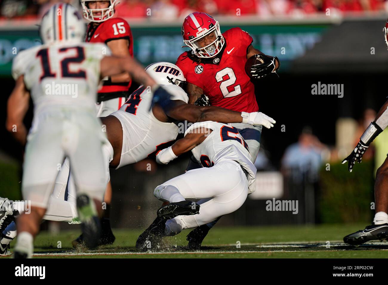 Georgia running back Kendall Milton (2) is brought down by Tennessee ...