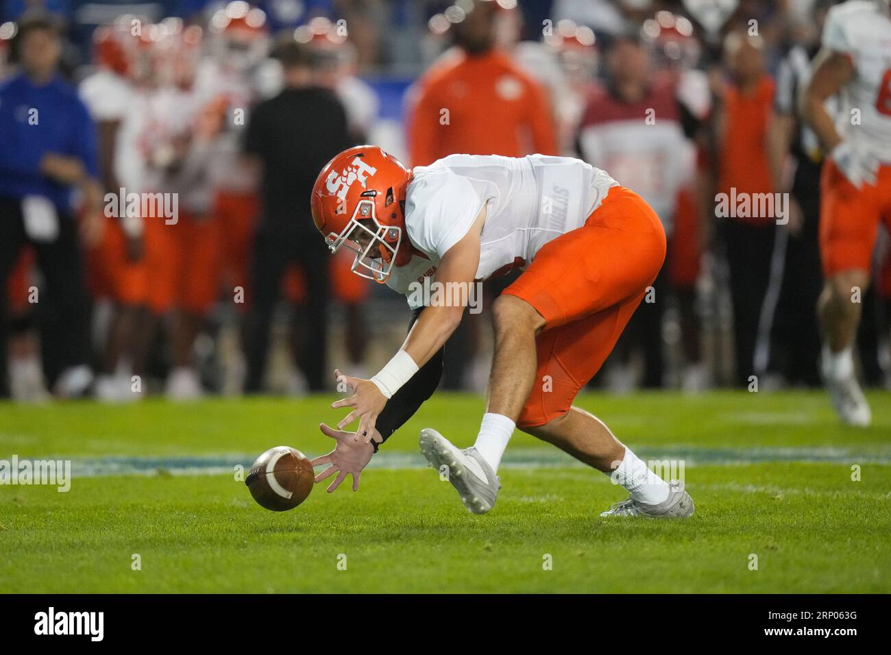 Sam Houston State quarterback Keegan Shoemaker recovers his fumble ...