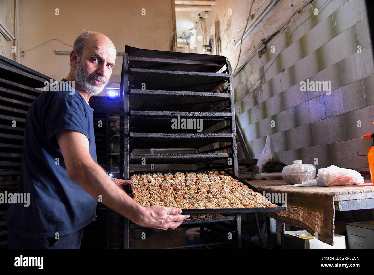 (180510) -- ALEPPO, May 10, 2018 -- A baker works in an ancient bakery ...
