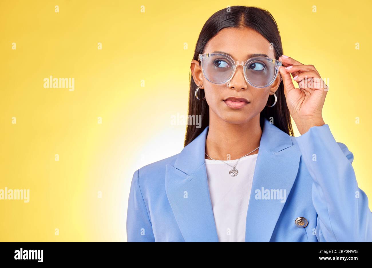 Thinking, woman and face with sunglasses in studio, yellow background ...