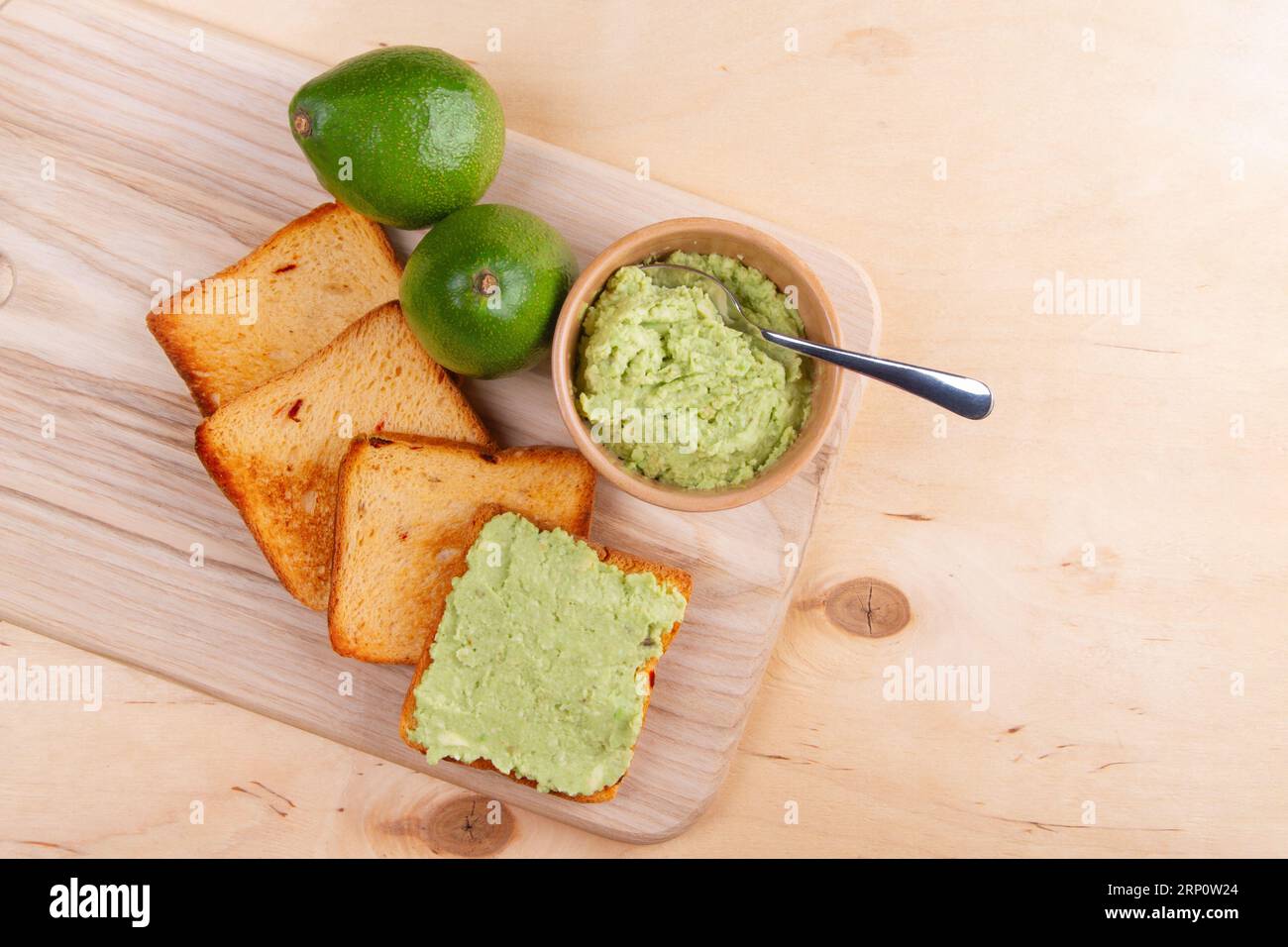 Top-down view of whole grain bread toasted to perfection and spread ...