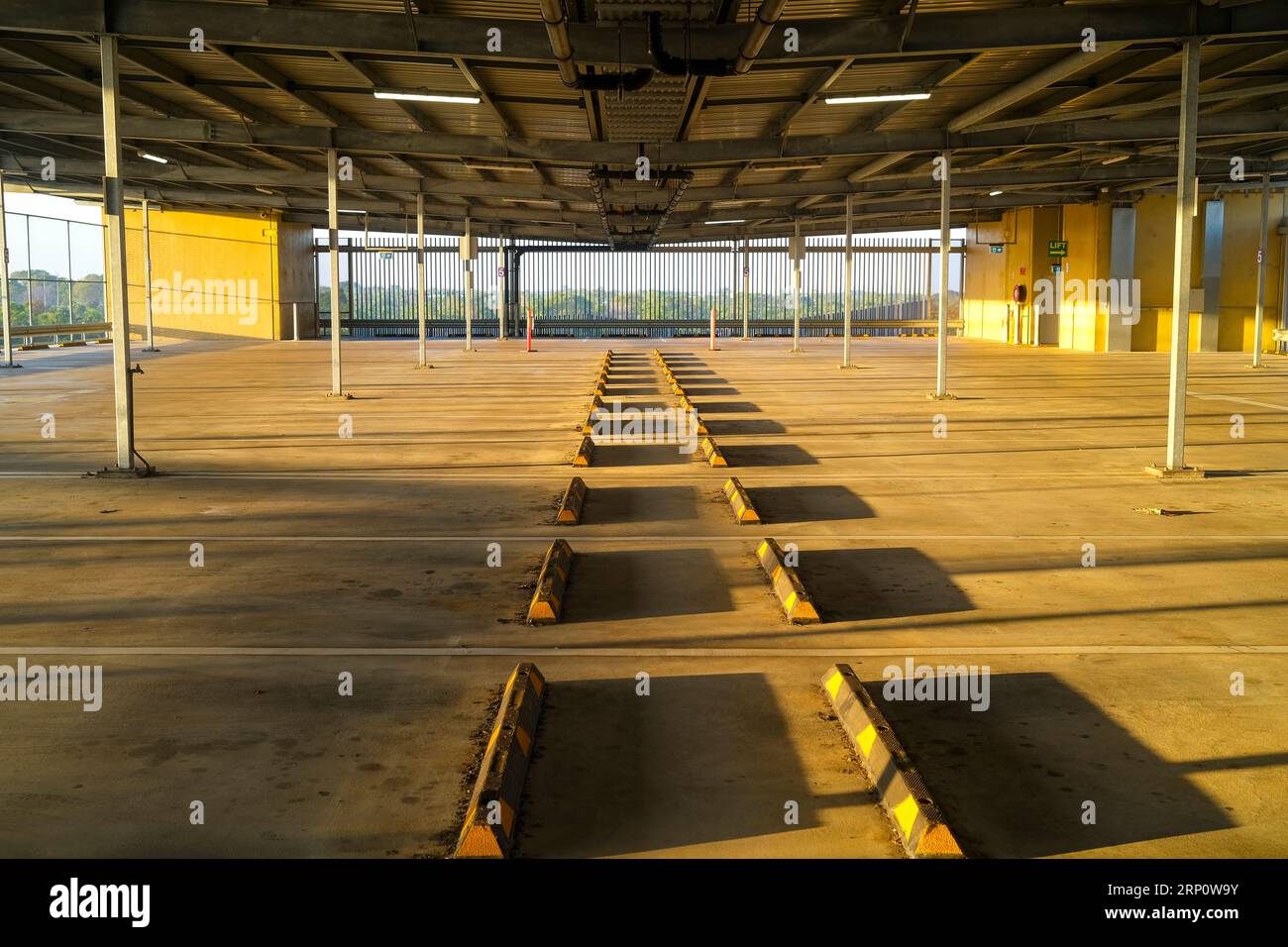 Empty indoor parking Stock Photo - Alamy