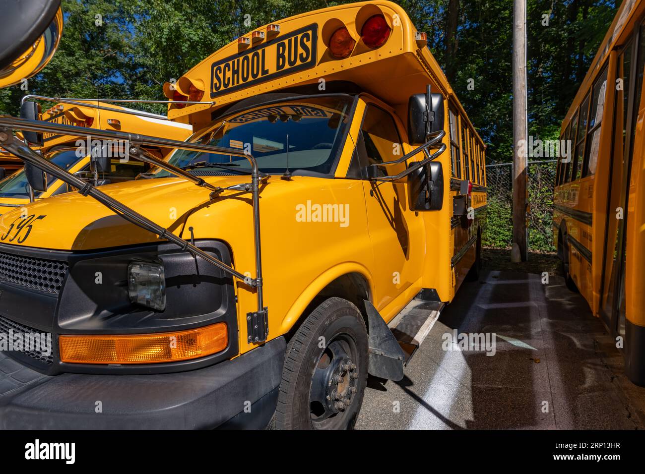 Front of a parked yellow school bus Stock Photo - Alamy