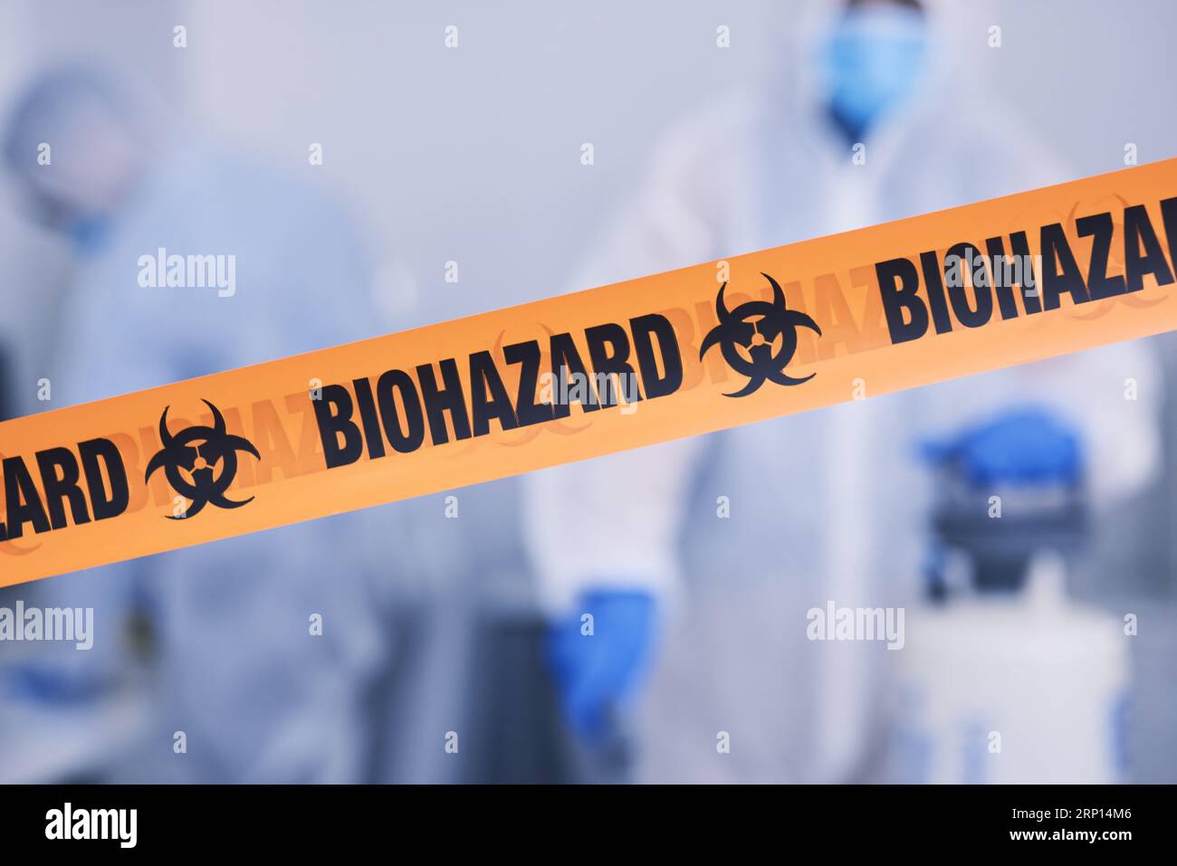 Biohazard, tape and people with caution working with toxic, biology or ...