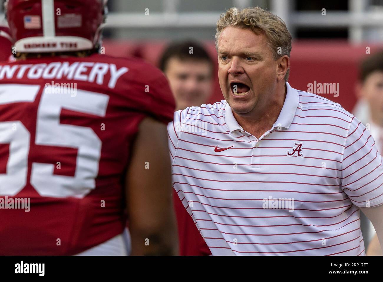 Alabama offensive line coach Eric Wolford works with his players before ...