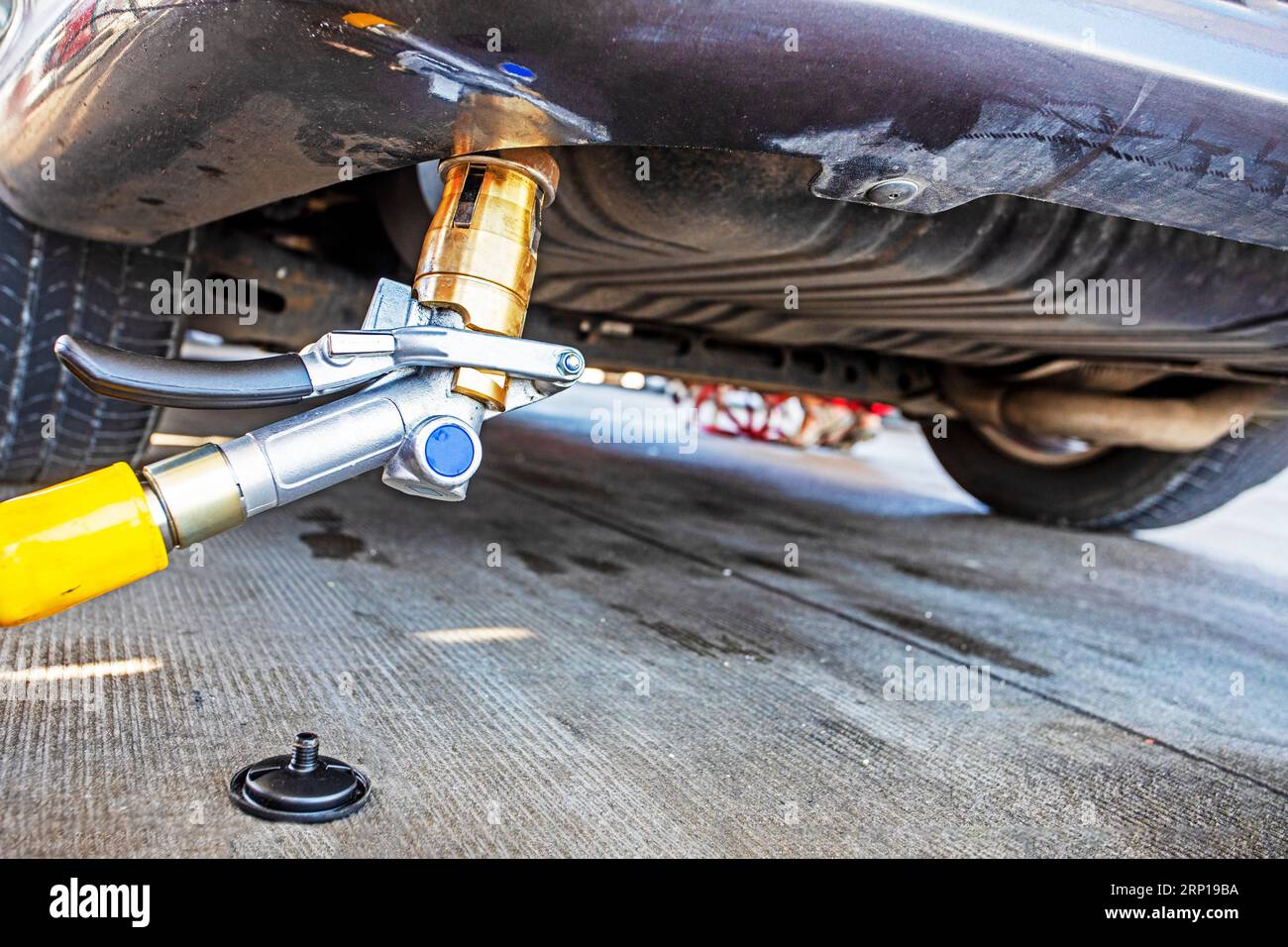 stopper or cap from the filling device LPG at the gas station near the ...