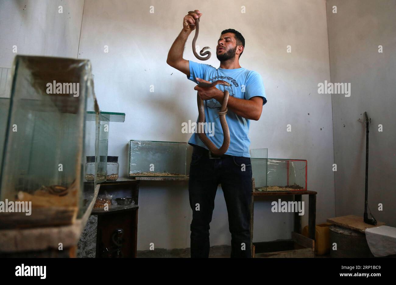 (180623) -- GAZA, June 23, 2018 () -- Abdul-Fattah Assaliya holds ...