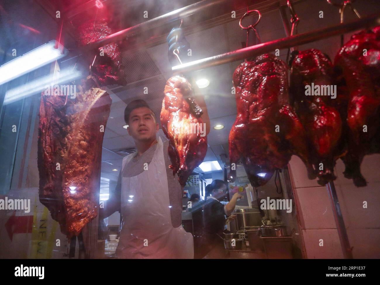 (180629) -- VANCOUVER, June 29, 2018 -- Anson Leung works at the HK BBQ ...