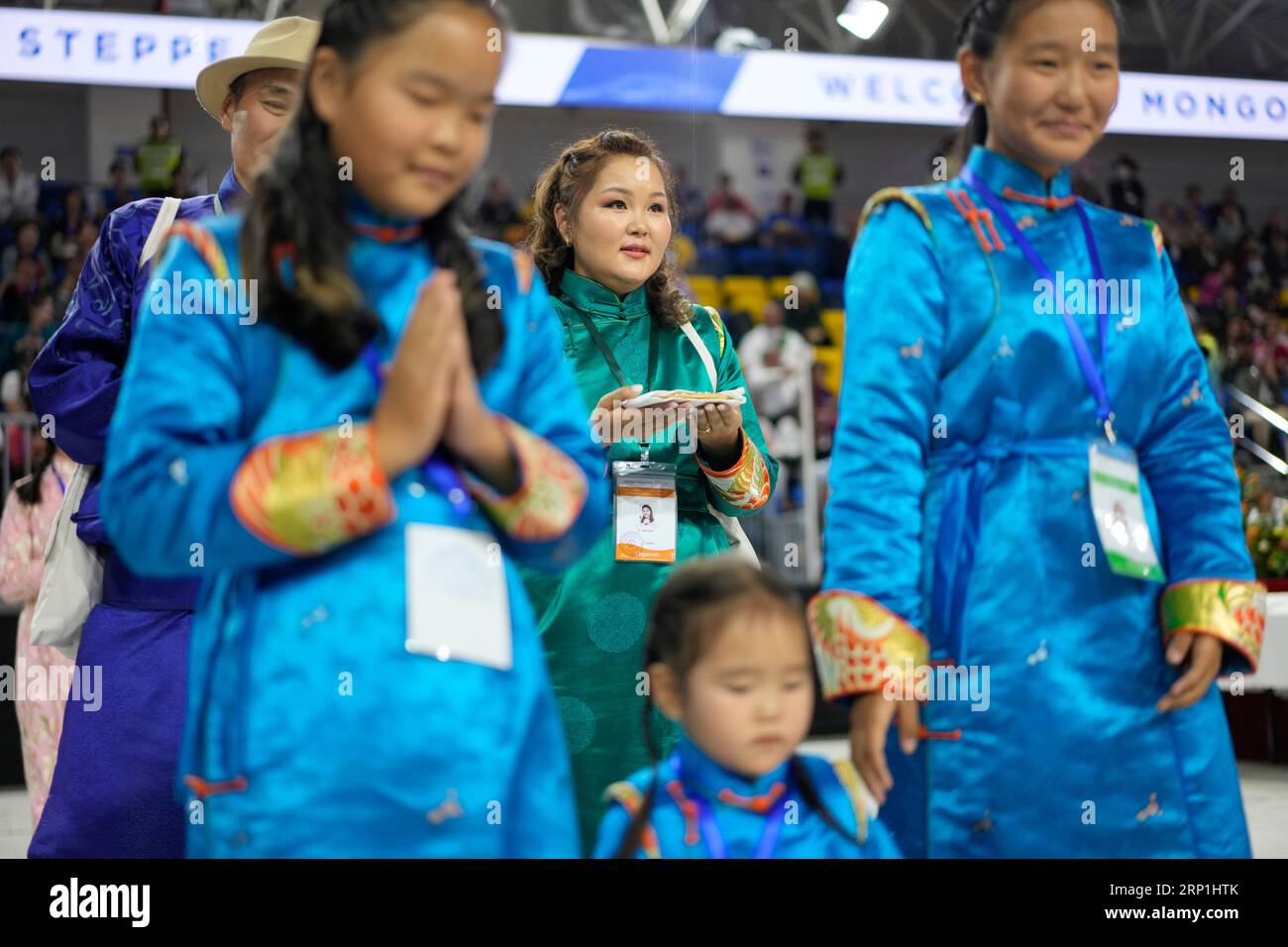 Faithful arrive at the Steppe Arena in the Mongolian capital ...