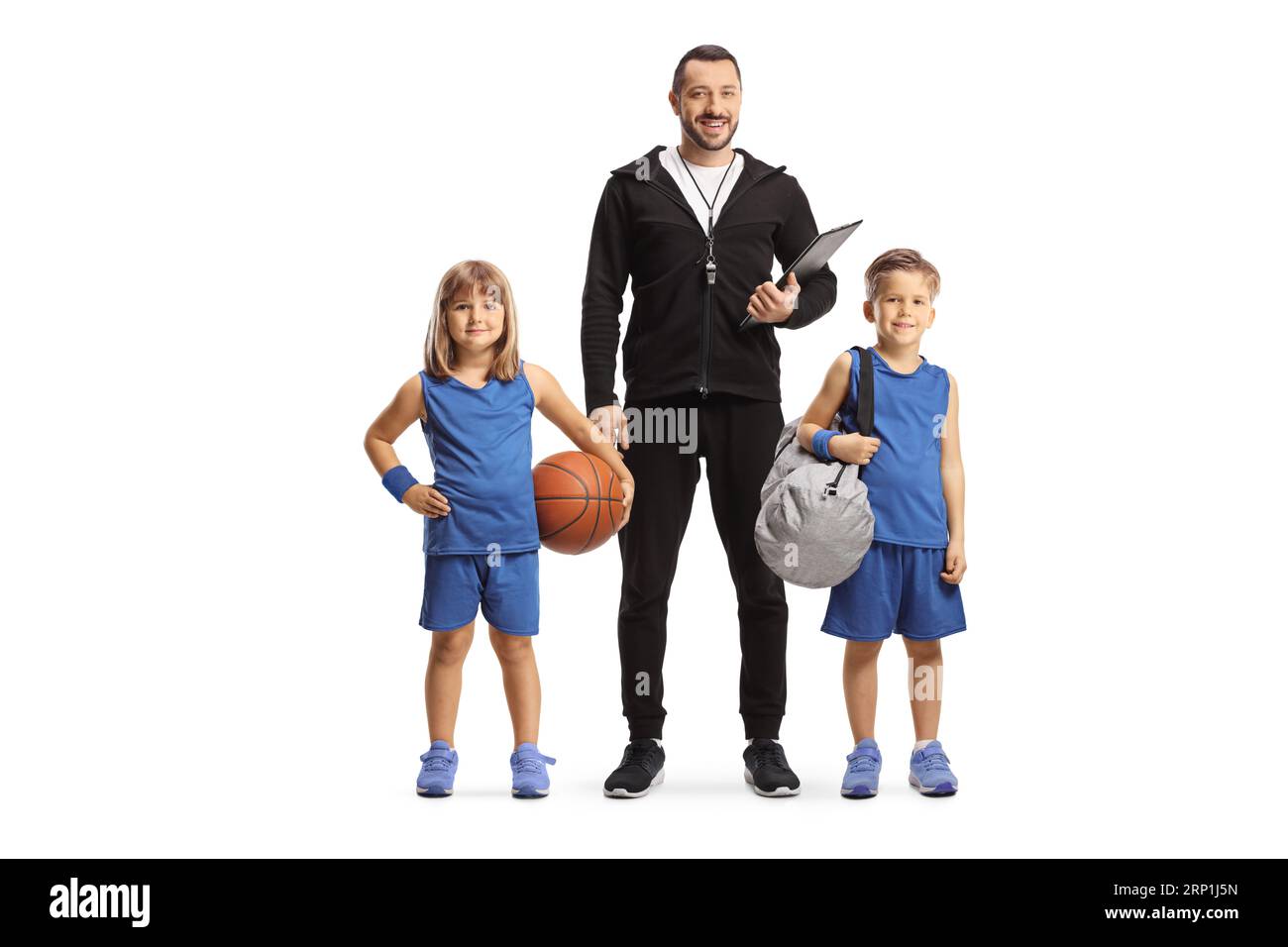 Coach posing with a children basketball team isolated on white ...