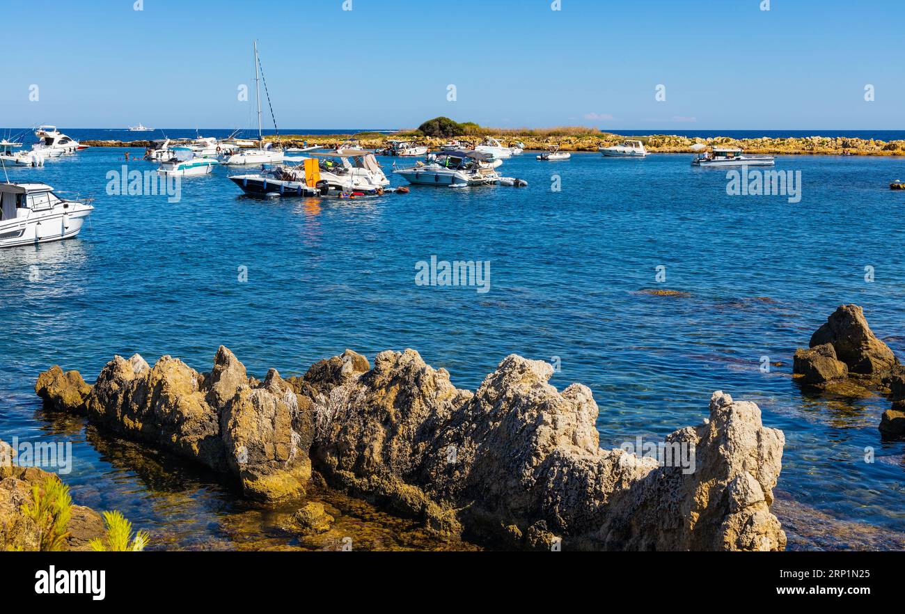Cannes, France - July 31, 2022: Rocky coast with forest of Ile Saint ...