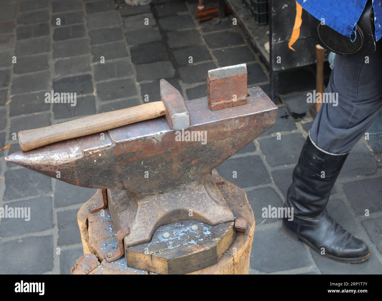 very heavy anvil for working iron in the master blacksmiths shop and a ...