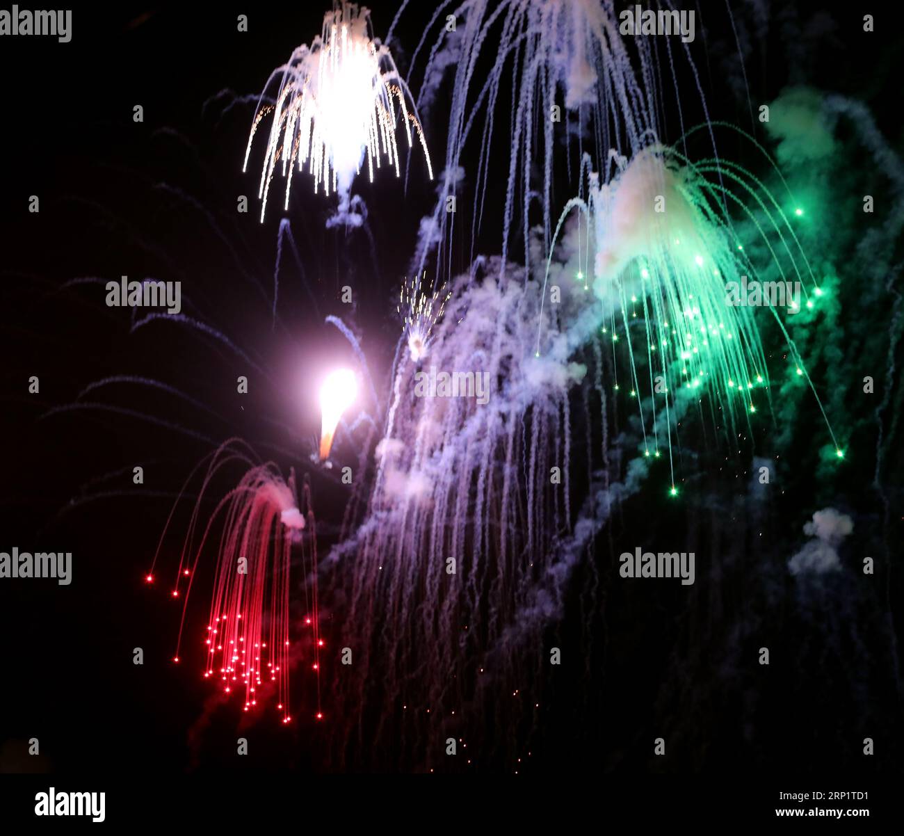colorful fiery sparks from huge fireworks during night celebrations ...