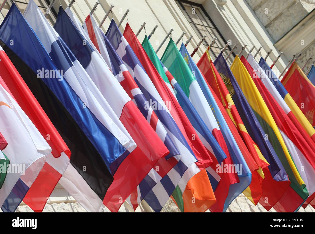flags of various world nations waving outside the building Stock Photo ...