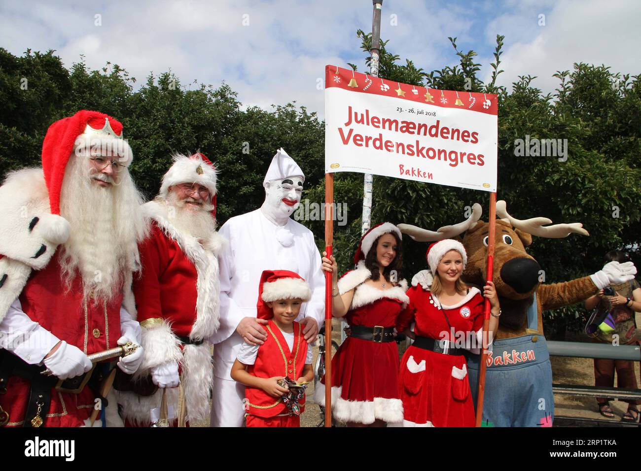 (180723) -- COPENHAGEN, July 23, 2018 -- People dressed as Santa Claus ...