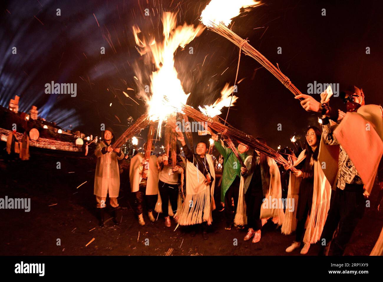 Group of people with torches hi-res stock photography and images - Alamy
