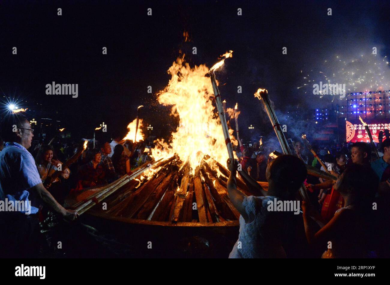 Group of people with torches hi-res stock photography and images - Alamy
