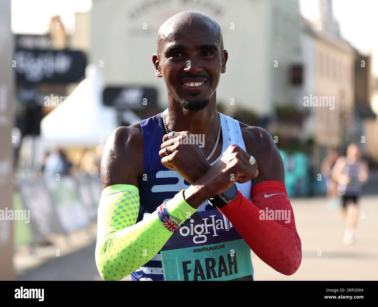 Sir Mo Farah crosses the finish line to place fourth in the Men's Elite ...