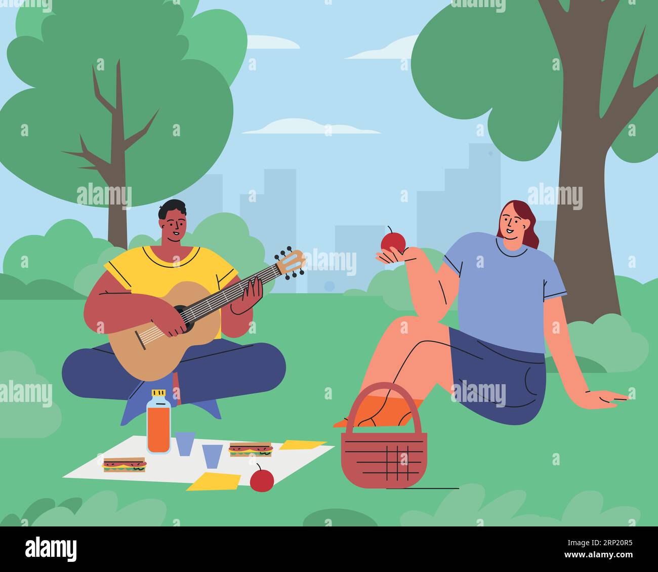 People in the park. Summer vacation and picnic. A man plays the guitar ...